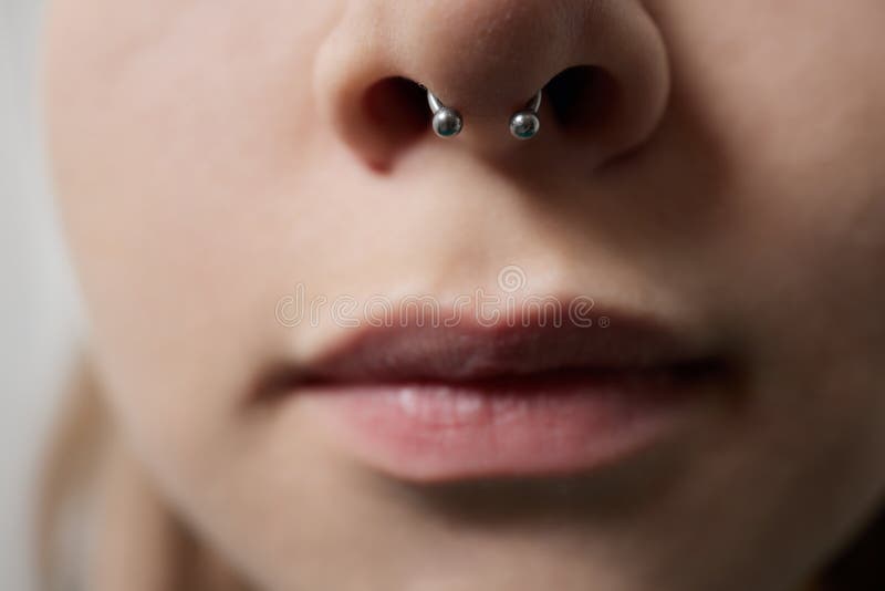 Smile or Frenulum Piercing Under the Upper Lip. Stock Image - Image of ...