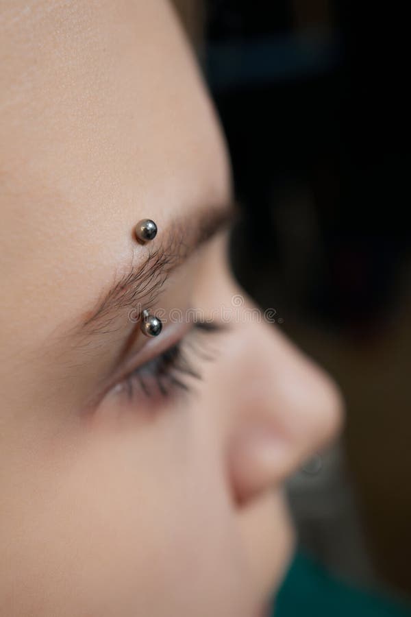 Smile or Frenulum Piercing Under the Upper Lip. Stock Image - Image of ...