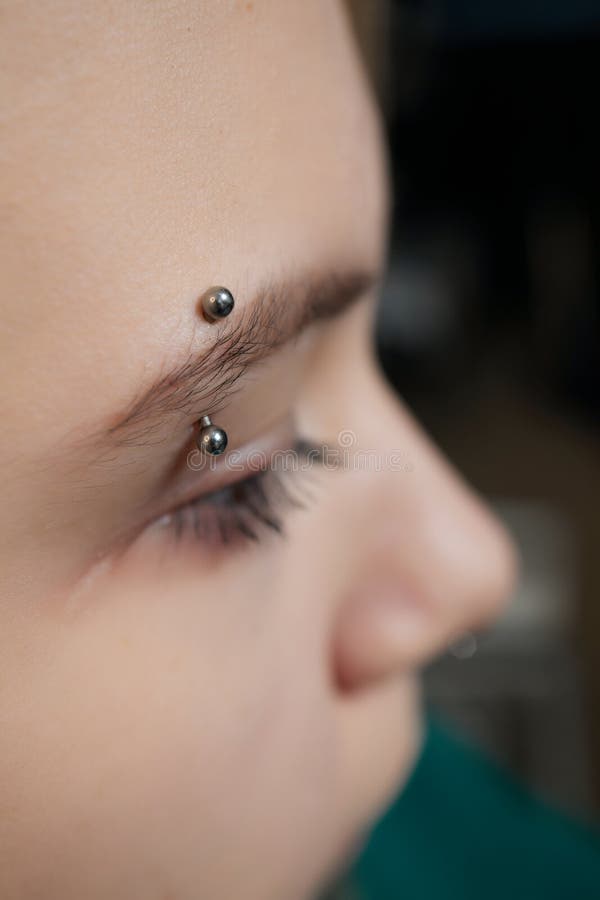 Smile or Frenulum Piercing Under the Upper Lip. Stock Photo - Image of ...