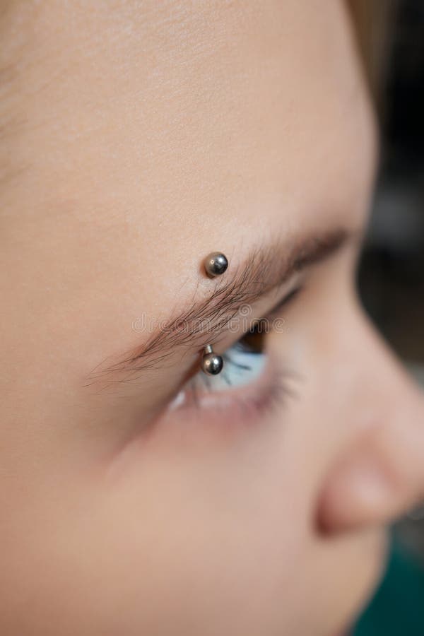 Smile or Frenulum Piercing Under the Upper Lip. Stock Photo - Image of ...