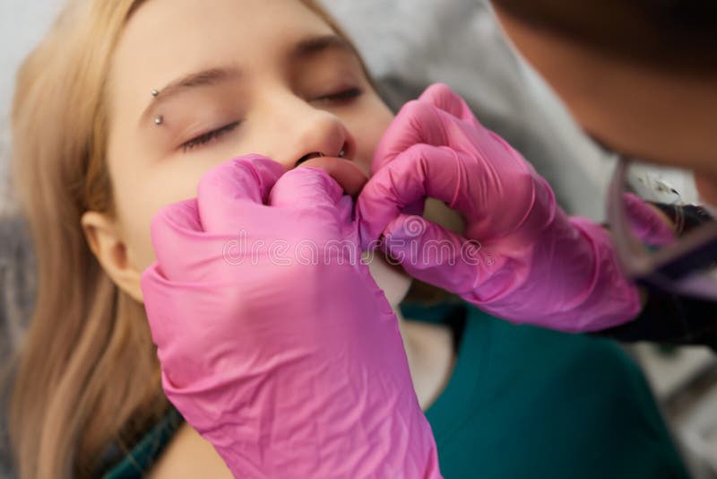 Smile or Frenulum Piercing Under the Upper Lip. Stock Image - Image of ...