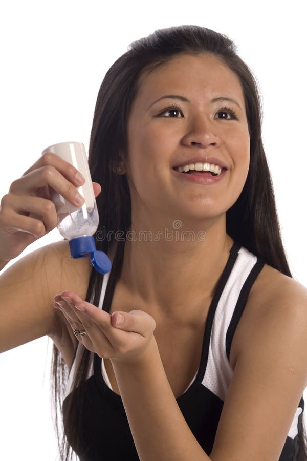 Putting lotion on leg stock photo. Image of care, female - 11626894