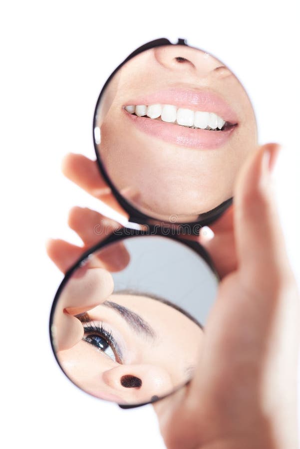 Smile in Reflection of Mirror Stock Photo - Image of smiling, holding ...