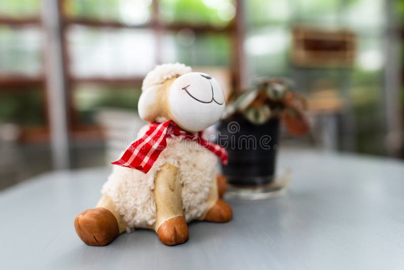 Smile Sheep Doll on the Table Stock Image - Image of indoor, table ...