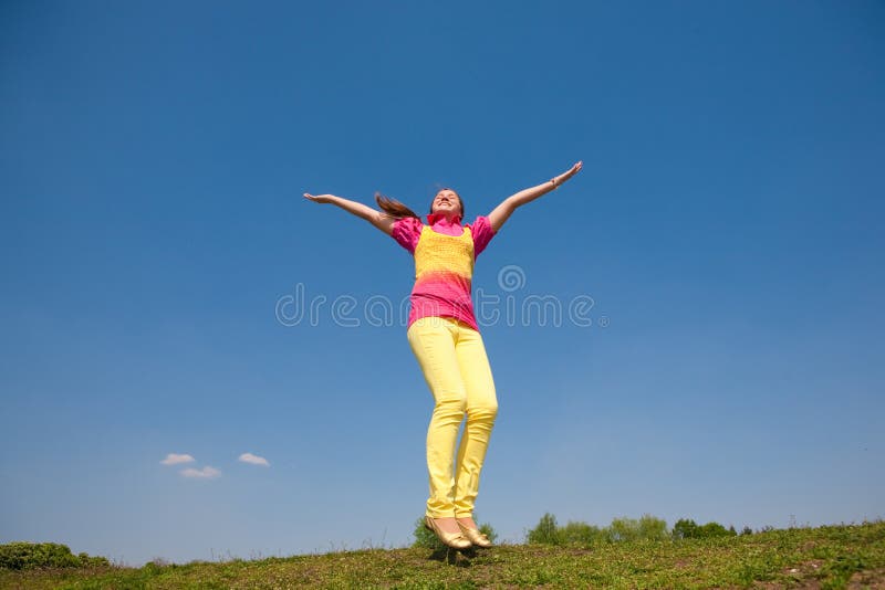Smile Teen Open Hands Jumping on Yellow Field Stock Photo - Image of ...
