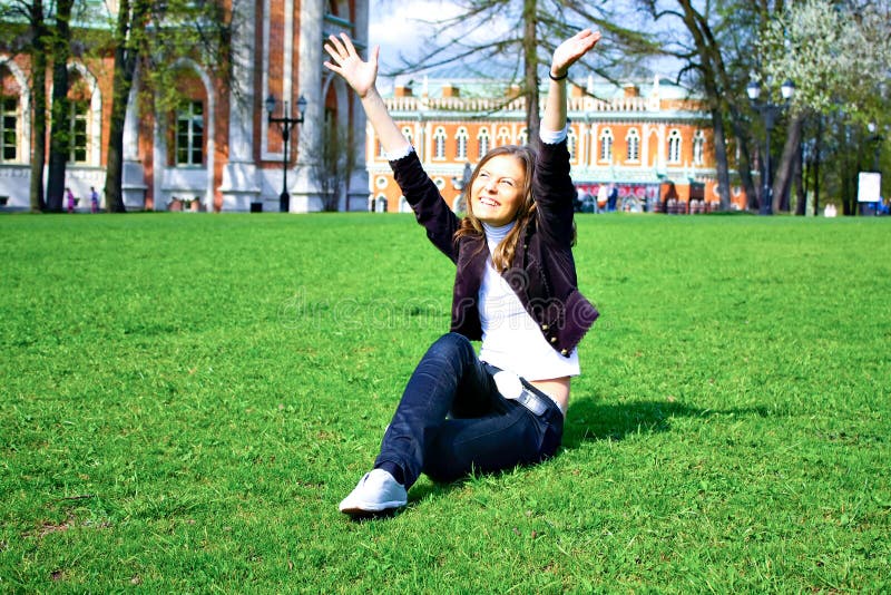 Smile Teen Open Hands Sitting on Field Stock Photo - Image of girl ...