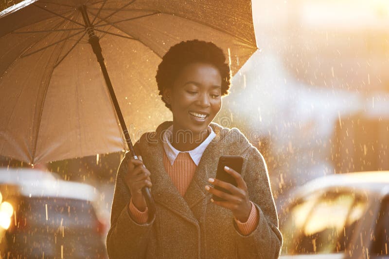 Smile, Umbrella and Black Woman with a Smartphone, Typing and ... Smile, Umbrella and Black Woman with a Smartphone, Typing and ...