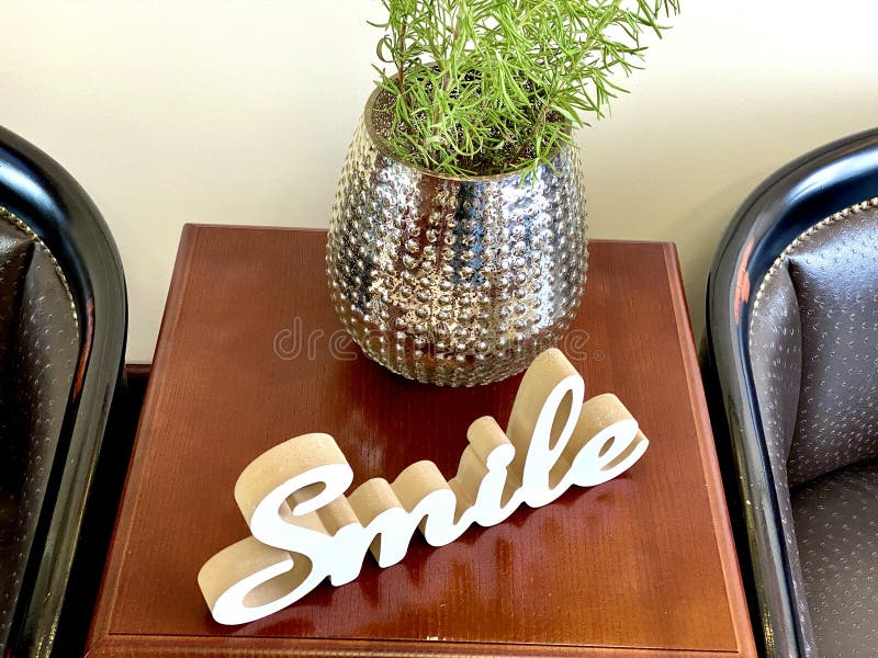 Smile on a wooden table stock photo. Image of donate - 248108034