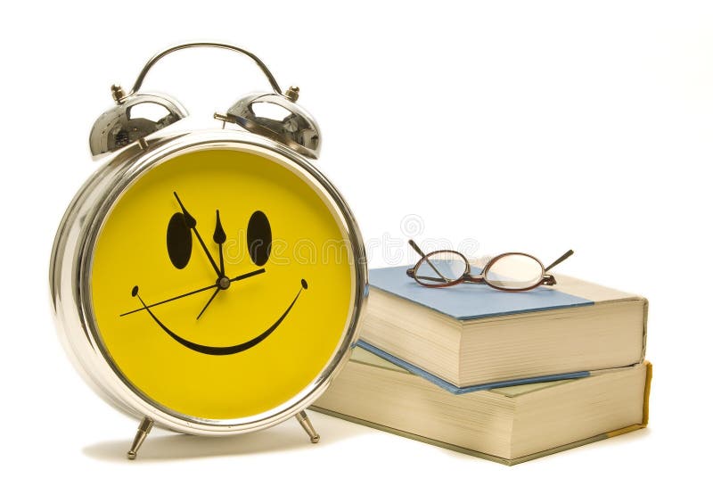 Smiley Alarm Clock with Books Und Lesebrille Stockbild - Bild von ...