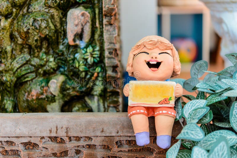 Smiley Doll Holding a Blank Signage. Stock Image - Image of girl ...