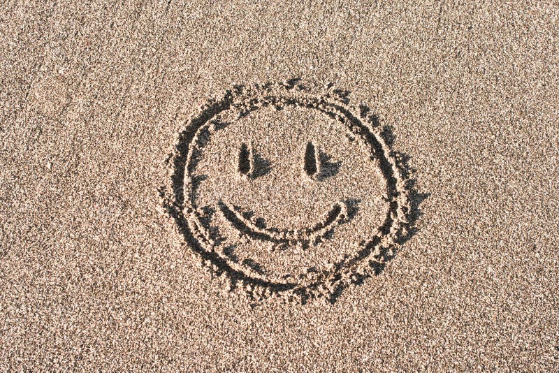Smiley Face Drawn on Beach Sand Stock Photo - Image of impression ...