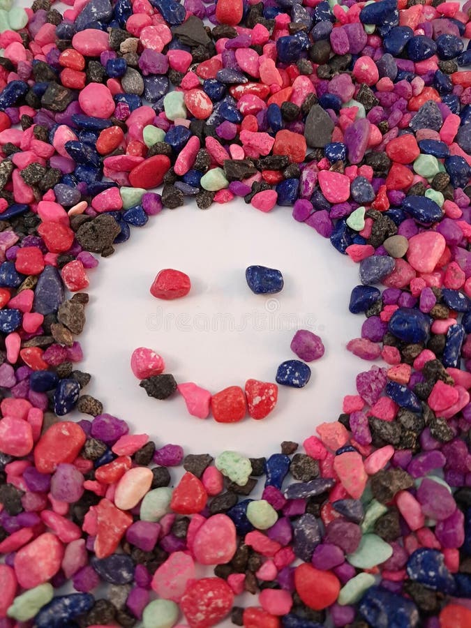 Smiley Face Made with Colorful Stones on a White Background Stock ...