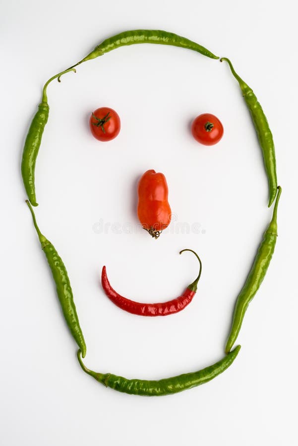 Smiley Face Made of Tomatoes and Chilli Peppers Stock Image - Image of ...