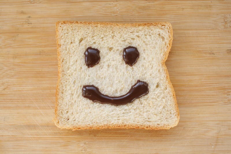 Smiley Face On A Piece Of Black Bread Stock Photo - Image of healthy ...