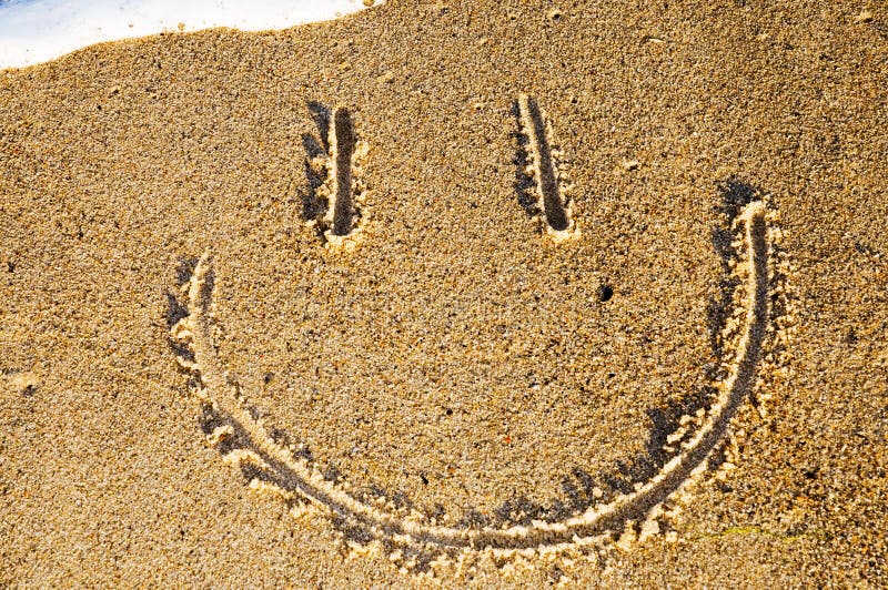 Smiley face in the sand stock photo. Image of smile, draw - 10003320
