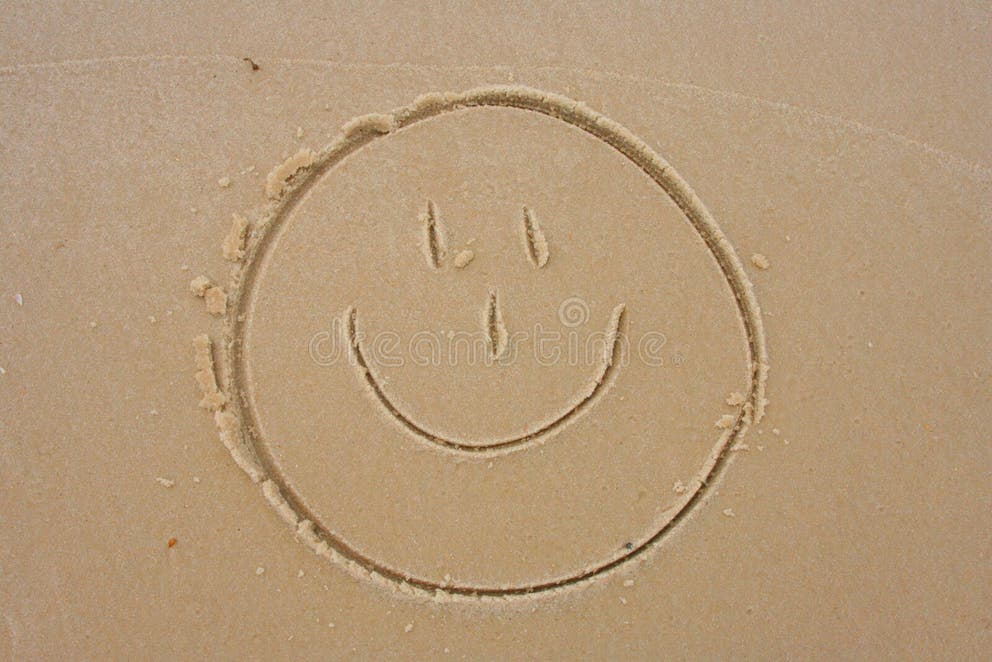Smiley Face in the sand stock image. Image of sign, simple - 1037019
