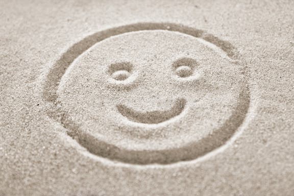 Smiley Face in the sand stock image. Image of exotic - 36557817