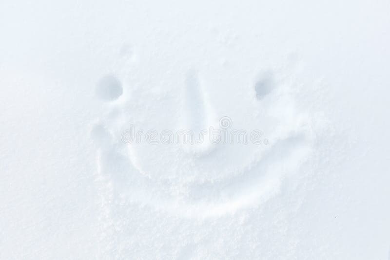 Smiley face in the snow stock image. Image of shiny, happy - 37939819
