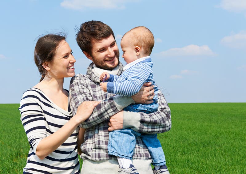 Smiley family at outdoors stock photo. Image of woman - 30695330