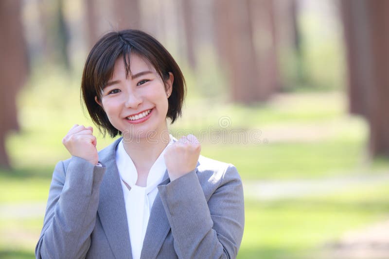 Smiley Female Office Worker Stock Image - Image of green, person: 241685361