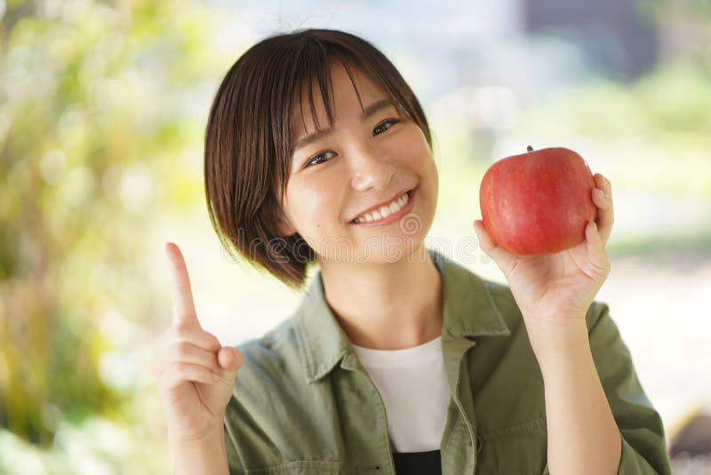 Female with an apple stock image. Image of skin, harvest - 238152809