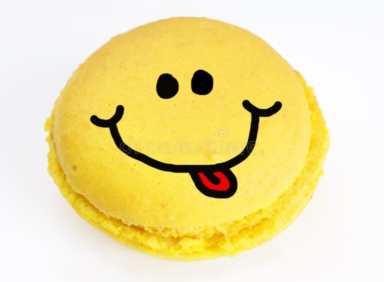 Smiley on yellow macaroon stock photo. Image of gastronomy - 33147302