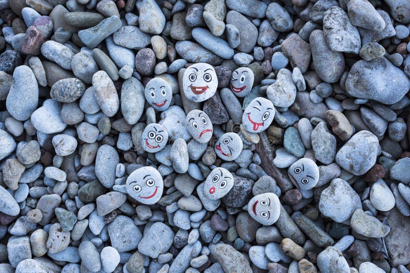 Smileys on pebbles stock photo. Image of emoticon, face - 69699816