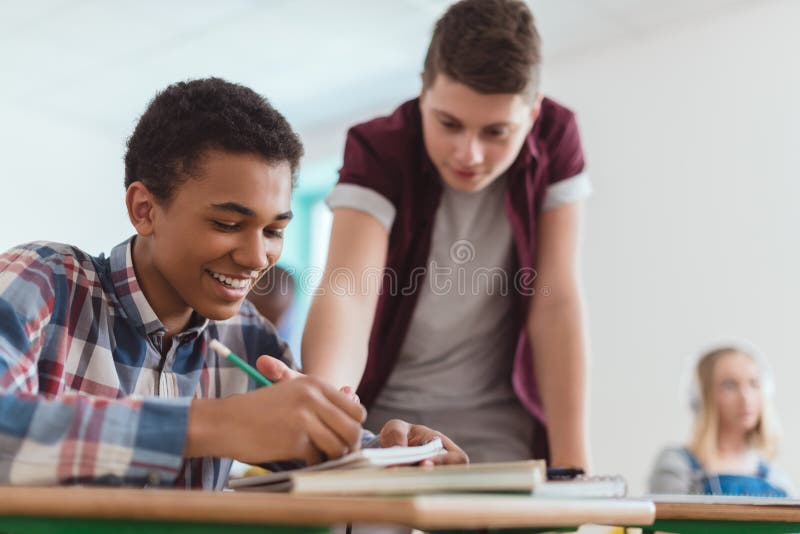 Teenage Boy Writing in Diary in Bedroom Stock Photo - Image of bedroom ...