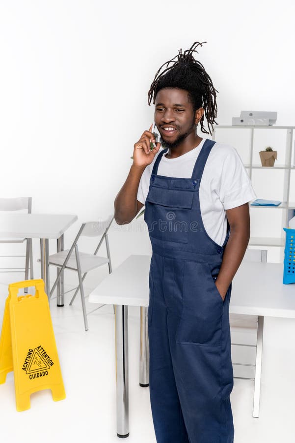 Smiling African American Cleaner Talking Stock Photo - Image of ...