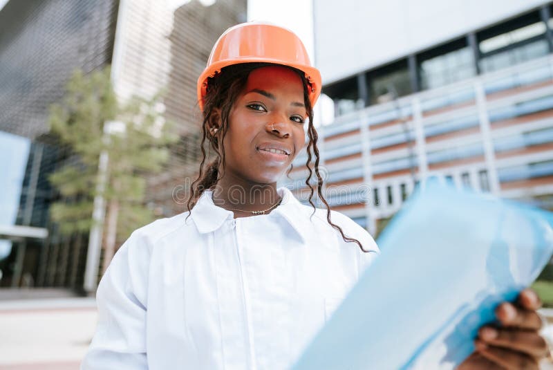 Smiling African American Female Inspector Checking Construction ...