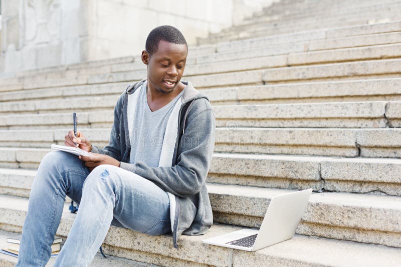 Smiling African-american Student Studying with Laptop Stock Image ...