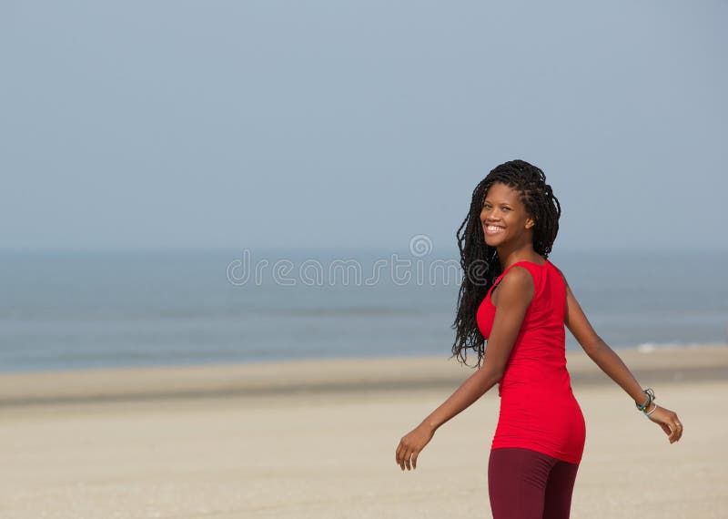 African American Woman Walking On The Beach Stock Image Image Of