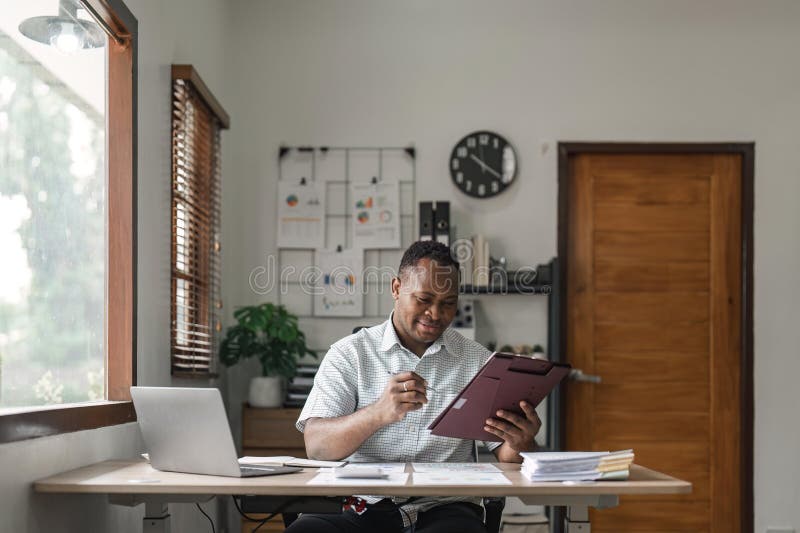 Smiling African Man Working at Home while Sitting. Concept of Young ...
