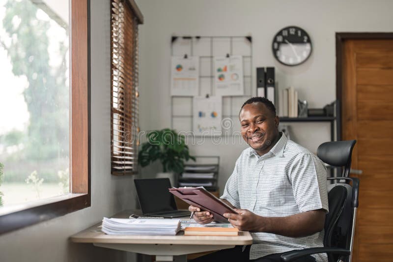 Smiling African Man Working at Home while Sitting. Concept of Young ...
