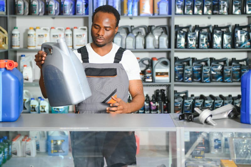 Smiling African Salesman Auto Parts Store Stock Photo - Image of ...