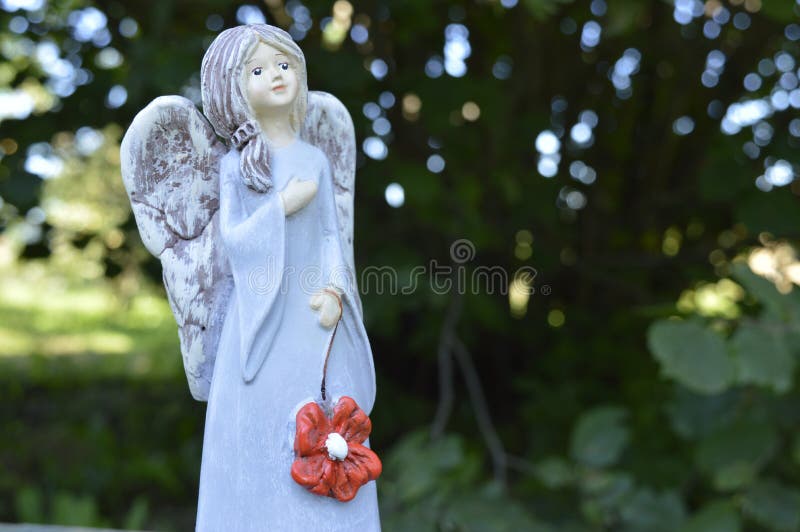 Smiling Angel in Blue Dress Stock Photo - Image of modest, beauty: 11692146