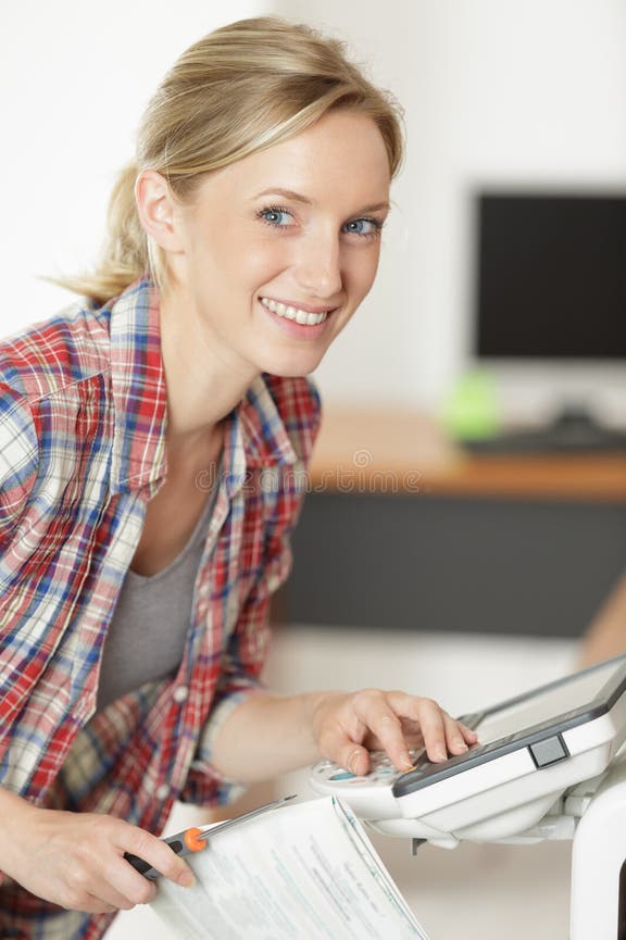 Smiling Apprentice Fixing Photocopy Stock Image - Image of book, pretty ...