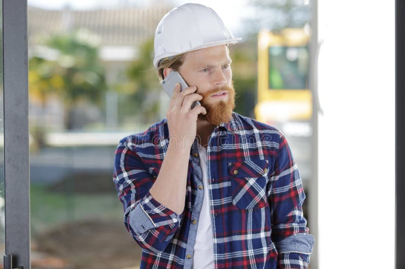 Smiling Architect with Safety Helme Having Phone Call Stock Photo ...