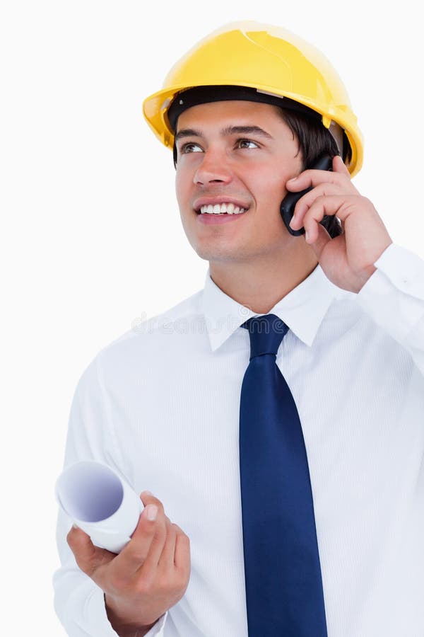 Engineer with cellphone stock photo. Image of person, isolated - 943056