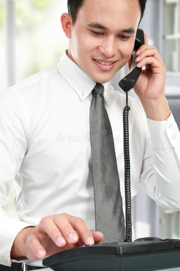 Smiling Asian Business Man Reading a Report Stock Photo - Image of male ...