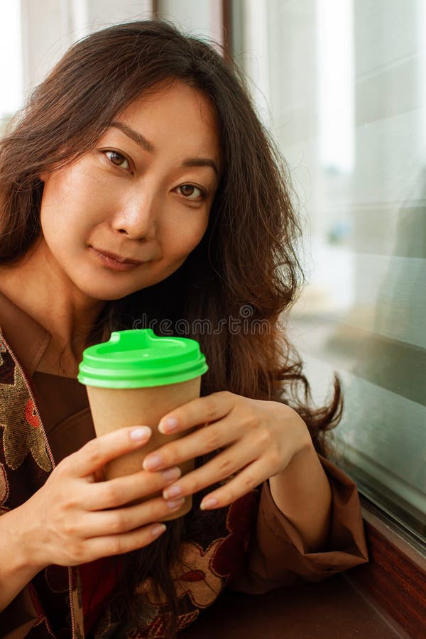 Smiling Asian Business Woman Having Coffee Break Near Office Stock ... Smiling Asian Business Woman Having Coffee Break Near Office Stock ...