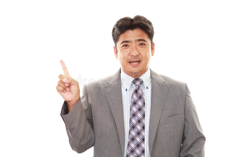 Smiling Asian businessman stock image. Image of beauty - 58164235