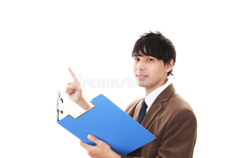 Smiling Asian businessman stock image. Image of asian - 58164309