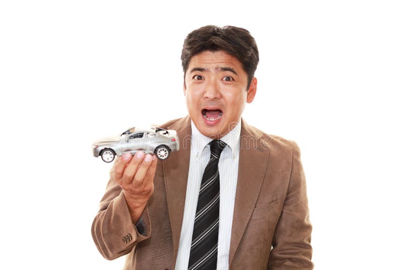 Smiling Asian businessman stock photo. Image of cars - 58952774 Smiling Asian businessman stock photo. Image of cars - 58952774