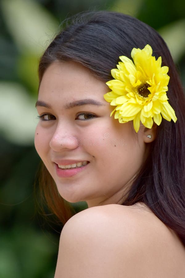 Smiling Asian Female with a Daisy Stock Image - Image of female ...
