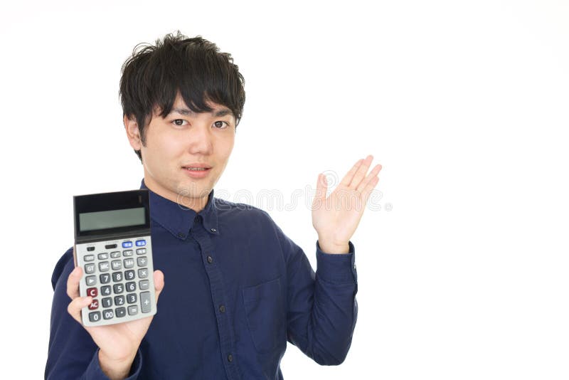 Man holding a calculator stock image. Image of calculator - 139227361