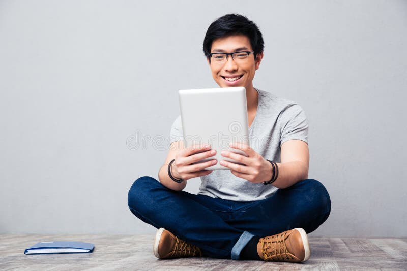 Smiling Asian Man Using Tablet Computer Stock Image - Image of handsome ...