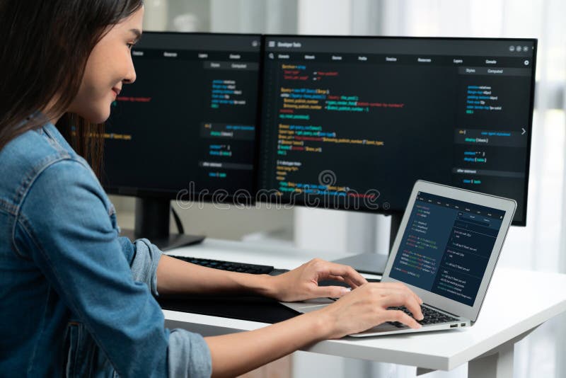 Smiling Asian it Typing Online Software Development on Laptop ...