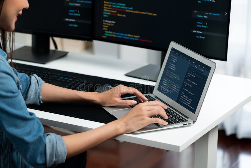 Smiling Asian it Typing Online Software Development on Laptop ...