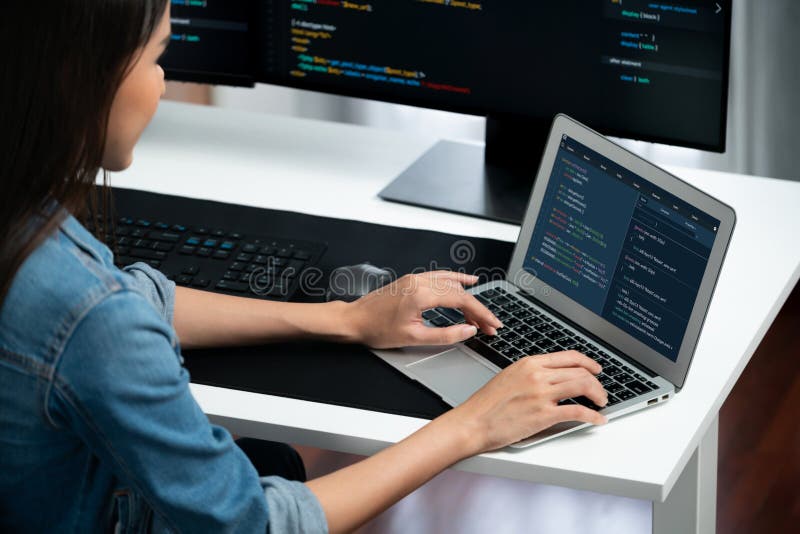 Smiling Asian it Typing Online Software Development on Laptop ...